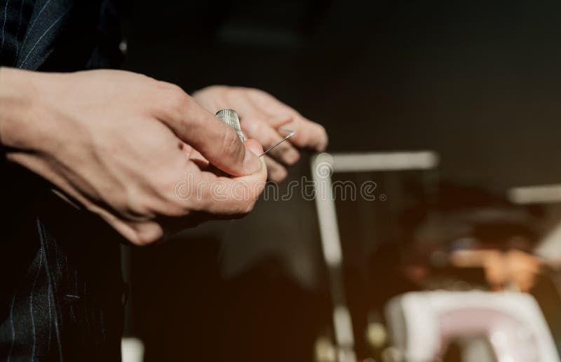 Male hands with a needle stock image. Image of attention - 235233293