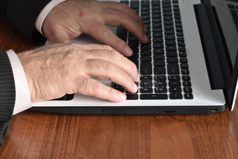 Male Hands of an Official Working at a Computer, Top View. Stock Photo ...