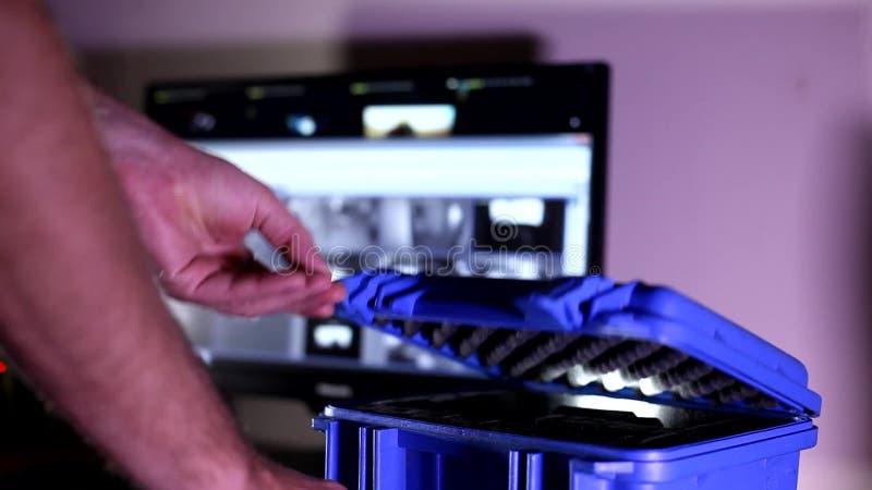 Video: Male hands open small blue high security level bulletproof case ...