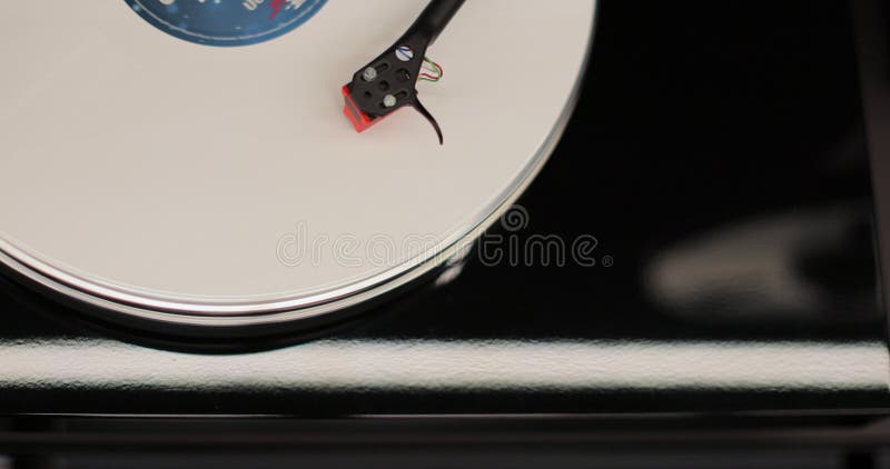 Male Hands Operating Vinyl Record Player with a Vinyl Disc. the Needle ...