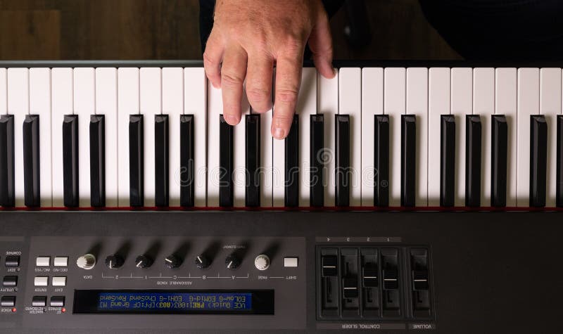 Hands Practicing on the Electronic Piano Keyboard Stock Image - Image ...