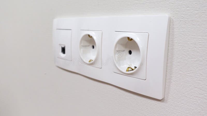Male Hands Pull Plugs Out of Socket Simultaneously in Room Stock ...