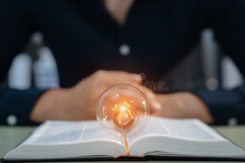 Male Hands Touching To Light Bulb Which Have Mechanical Gear Inside on ...