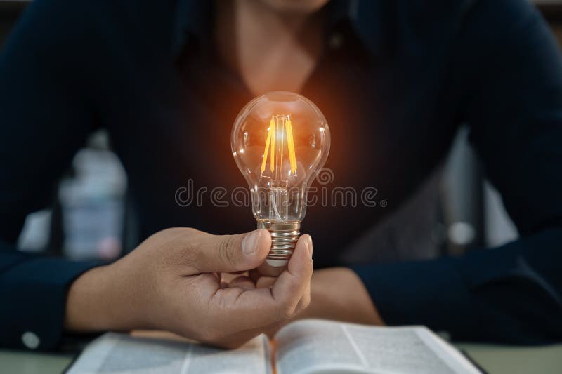 Male Hands Touching To Light Bulb Which Have Mechanical Gear Inside on ...