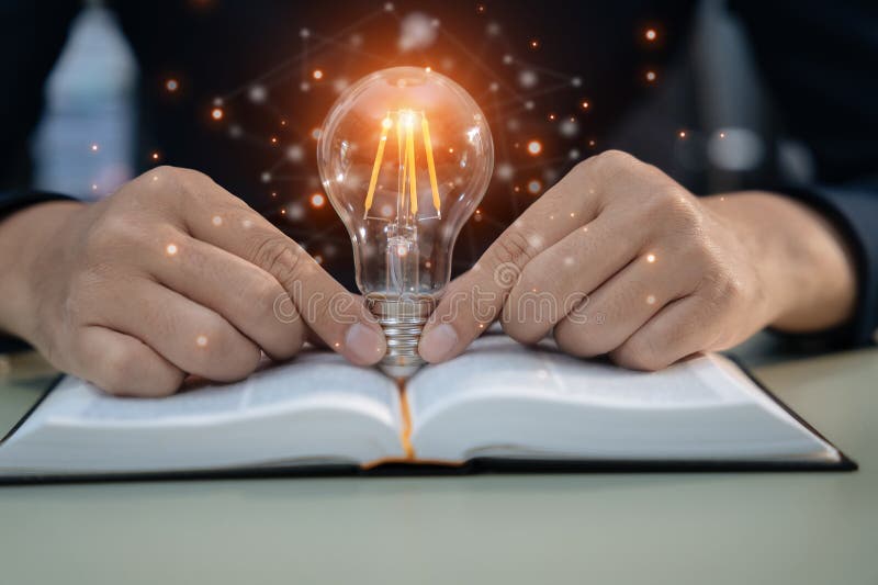Male Hands Touching To Light Bulb Which Have Mechanical Gear Inside on ...