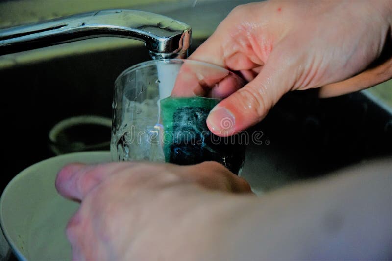 Male Hands Washing a Glass with the Help of a Sponge Stock Image ...