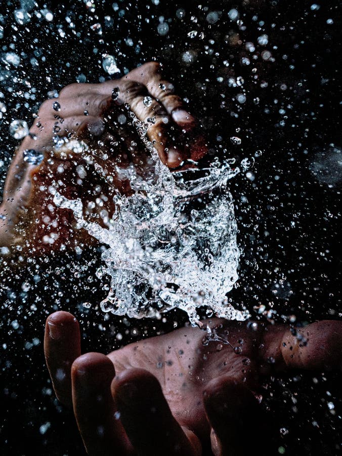 Male Hands with Water Splashes in the Middle Stock Image - Image of ...