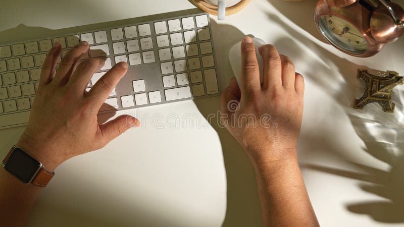 Male Hands Working with Computer Device on White Concept Worktable ...