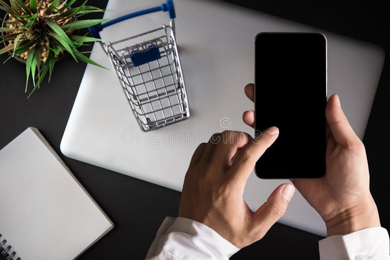 Male Hands Working on Modern Smartphone. Office Desktop on Table Stock ...