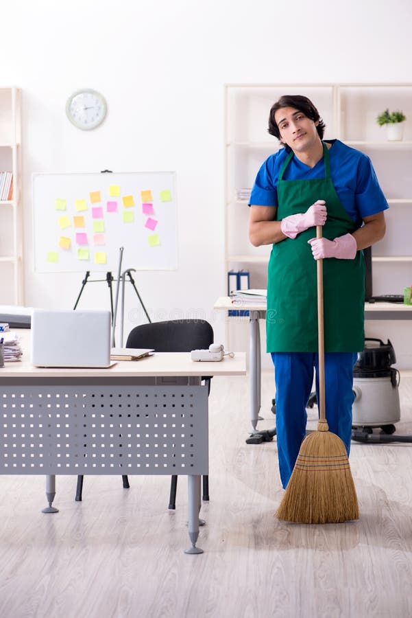 The Male Handsome Professional Cleaner Working in the Office Stock ...