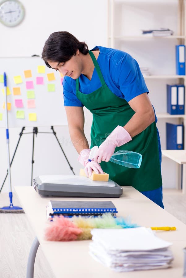 The Male Handsome Professional Cleaner Working in the Office Stock ...