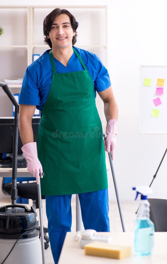 Male Handsome Professional Cleaner Working in the Office Stock Photo ...