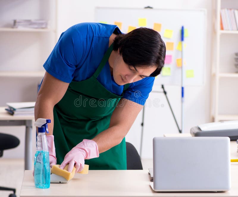 Male Handsome Professional Cleaner Working in the Office Stock Image ...