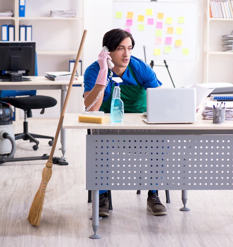 Male Handsome Professional Cleaner Working in the Office Stock Image ...