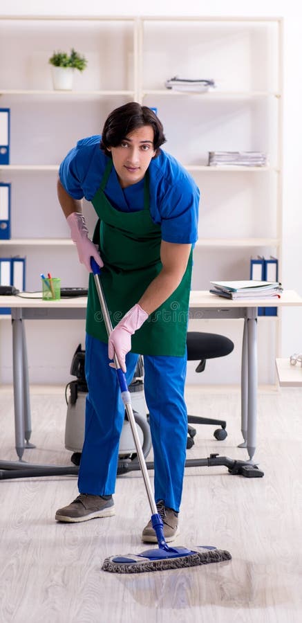 Male Handsome Professional Cleaner Working in the Office Stock Photo ...