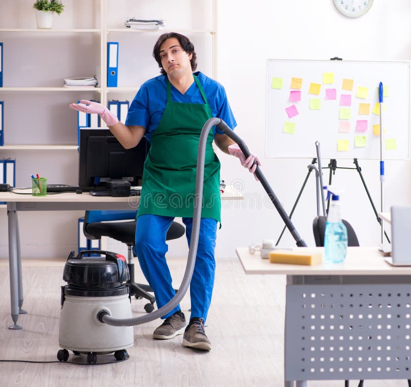 Male Handsome Professional Cleaner Working in the Office Stock Image ...