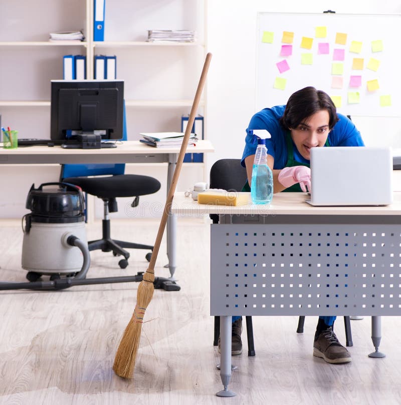 Male Handsome Professional Cleaner Working in the Office Stock Image ...
