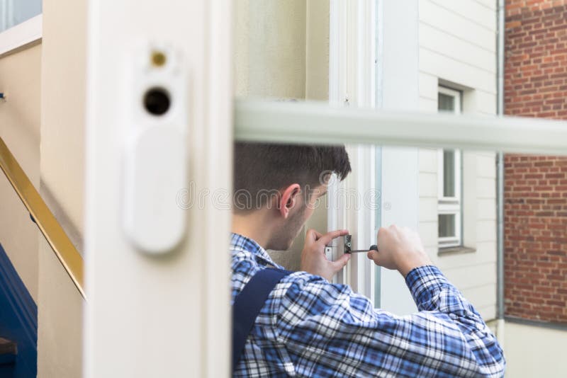 Handyman Fixing Window with Screwdriver Stock Photo - Image of modern ...