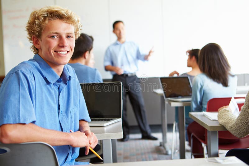 Male High School Student Using Laptop in Classroom Stock Image - Image ...