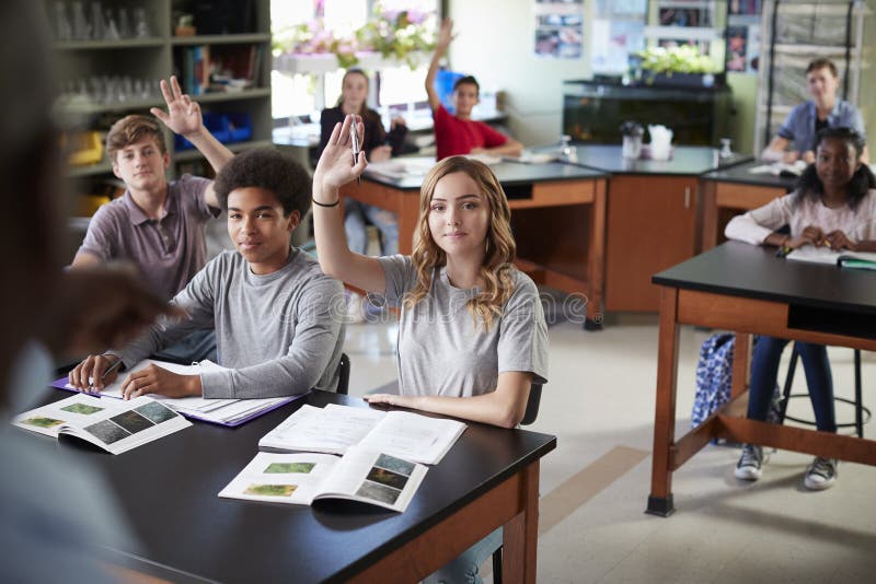 Male High School Tutor Teaching Students in Biology Class Stock Image ...
