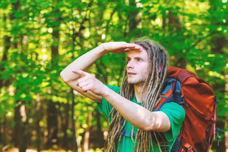 Male Hiker with Backpack Pointing at Something Ahead Stock Image ...