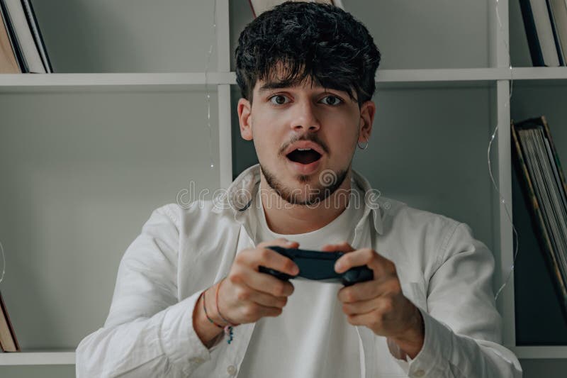 Male at Home with Joystick Playing Video Games Stock Image - Image of ...