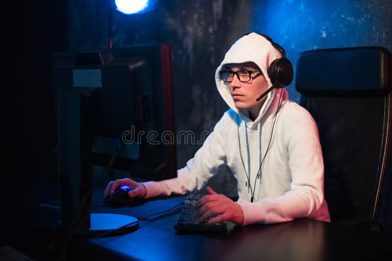 Male Hooded Gamer Playing Online Game on Pc Computer Stock Photo ...