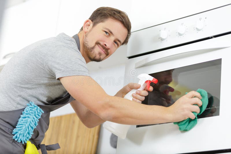 Male housekeeper at work stock photo. Image of caucasian - 256656868