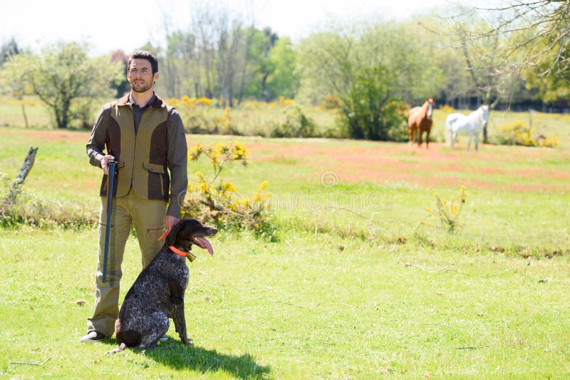 Male Hunter with Hunting Dog Stock Photo - Image of front, behave ...