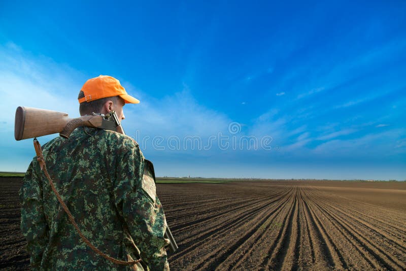 Male Hunter Looking at Field during Hunt Season. Stock Image - Image of ...