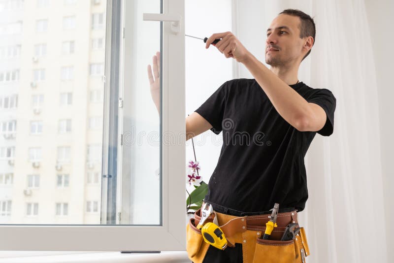 Male Industrial Builder Worker at Window Installation in Building ...