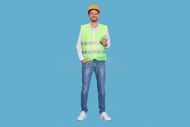Male Industrial Engineer in Uniform with Phone on White Background ...