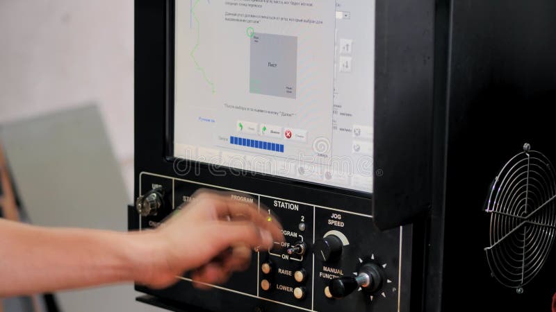 Male Industrial Plasma Cutter Operator Enters Data into the Program ...