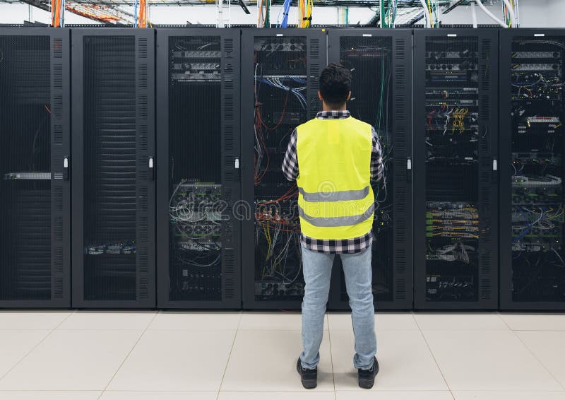 Male Informatic Engineer Working in Server Room Database Stock Image ...