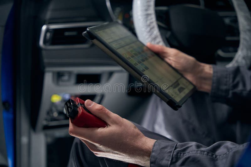 Male Inspecting Board Computer System in the Workshop Stock Photo ...