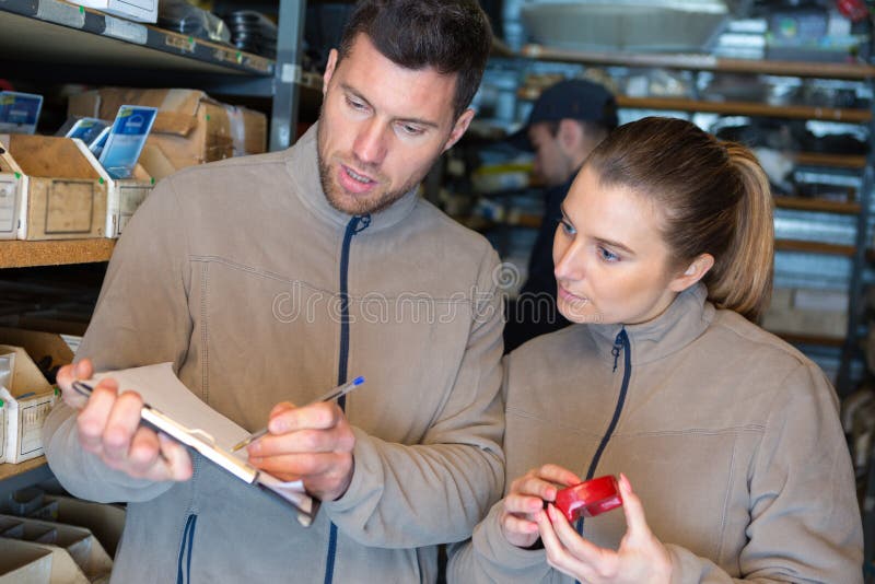 Male Inventory Worker Checking List Stock Image - Image of store, depot ...