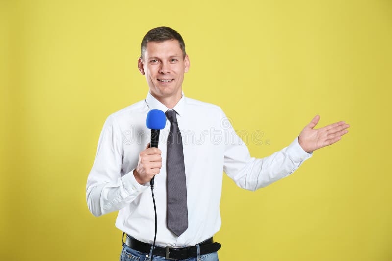 Male Journalist With Microphone On Background Stock Photo - Image of ...