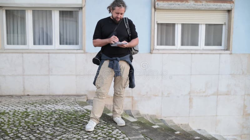 Male Journalist Writing Notes on a Notepad Stock Video - Video of notes ...