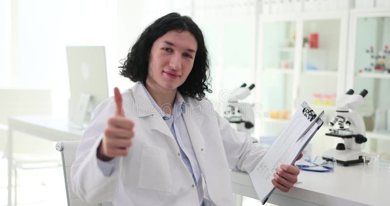 A Laboratory Assistant in White Gloves Puts Eppindorf into a Laboratory ... A Laboratory Assistant in White Gloves Puts Eppindorf into a Laboratory ...