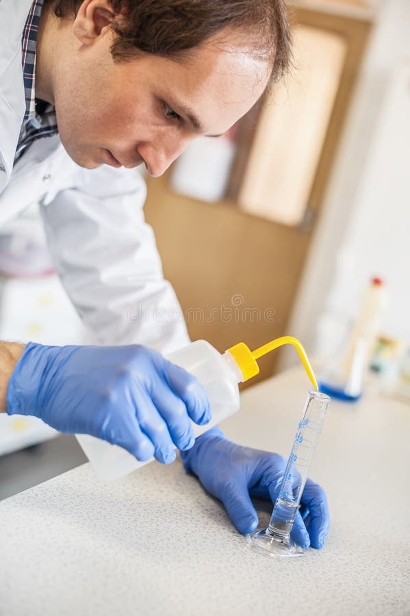 Male Laboratory Researcher Performs Tests Stock Photo - Image of gloves ...
