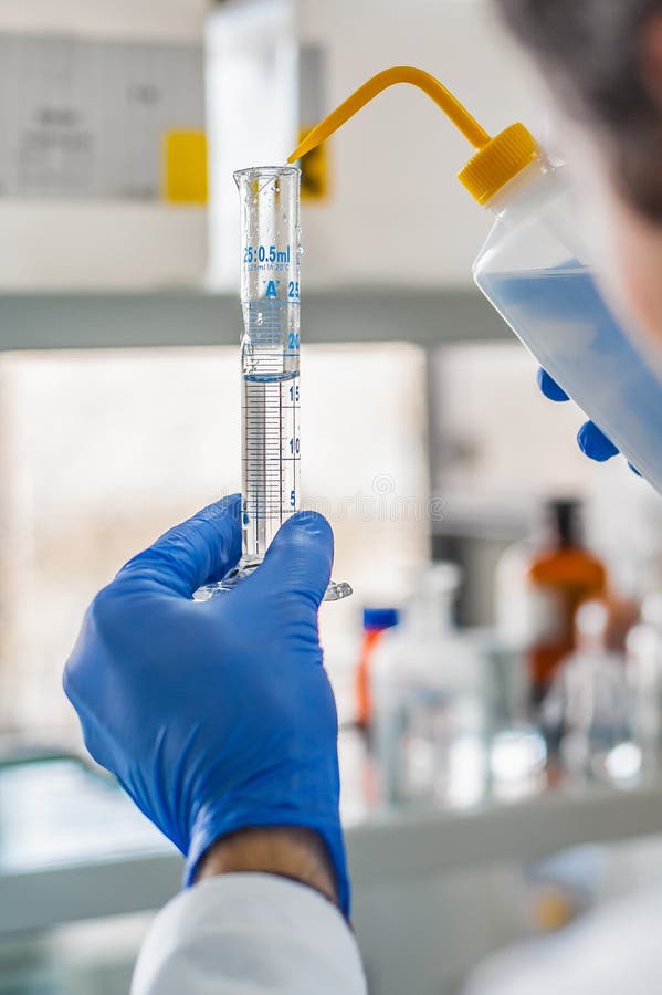 Male Laboratory Researcher Performs Tests Stock Image - Image of ...