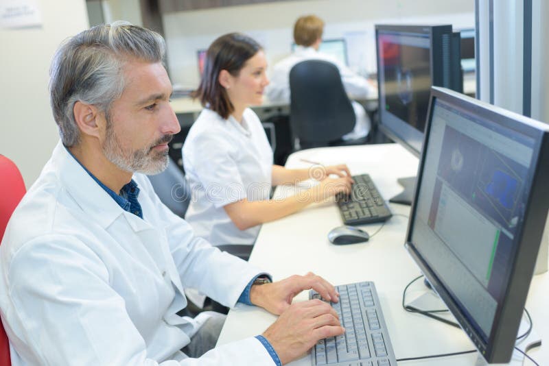 Male Laboratory Worker Using Computer Stock Image - Image of person ...