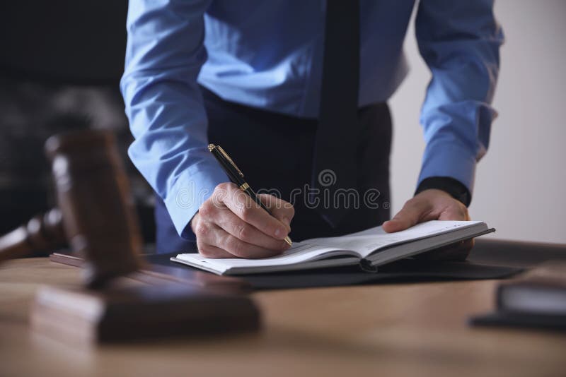 Male Lawyer Working at Table in Office Stock Image - Image of ...