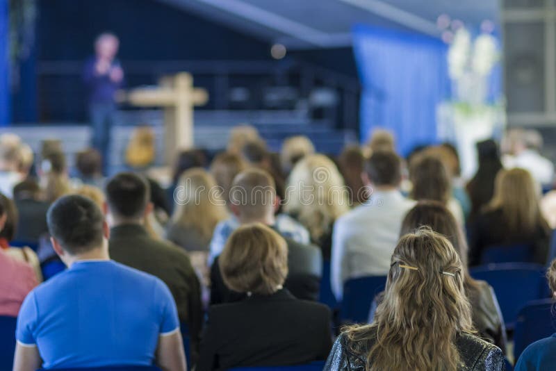 Male Leader Lecturer Speaking in Front of the Large Group of People ...