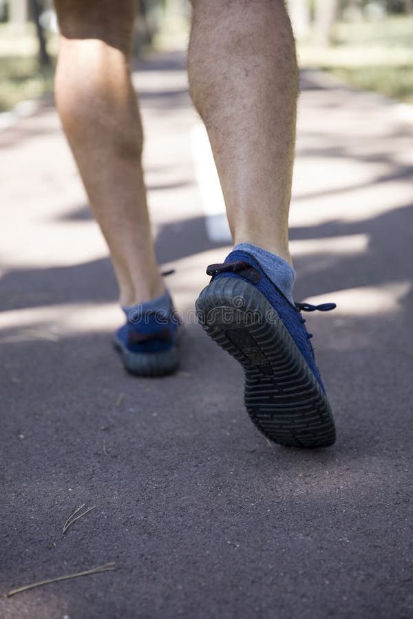 Male legs stock photo. Image of outside, road, jogging - 129555472