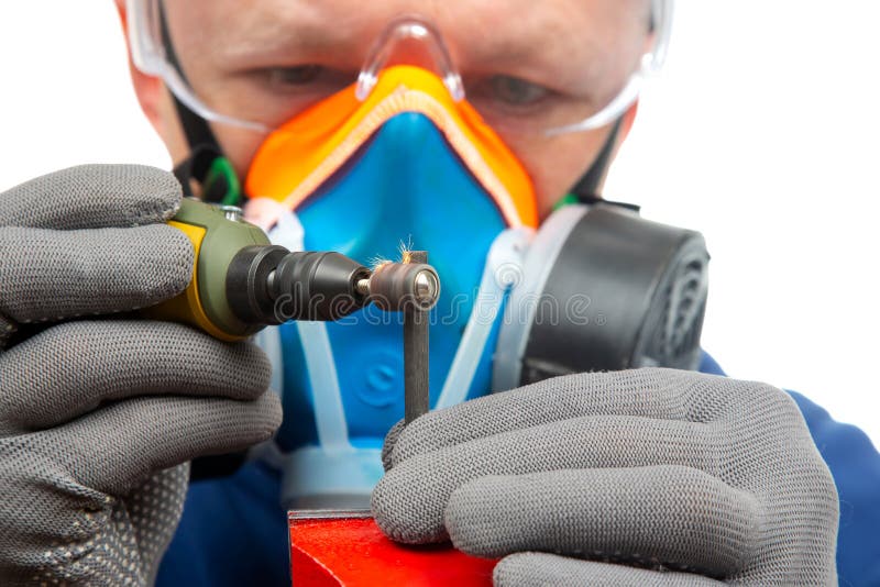 Male Locksmith Worker Processes Metal with Engraving Drill Cutting. the ...