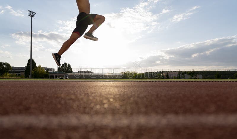 Male Long Jumper in Mid Jump Stock Photo - Image of challenge ...