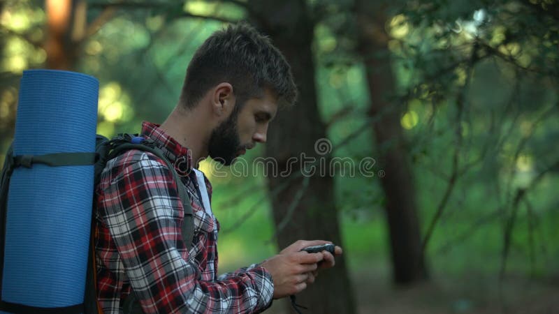 Male Lost in Forest Using Compass To Navigate, Finding Way Out from ...
