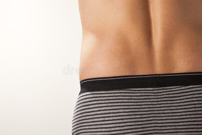 Male Lower Back stock image. Image of undies, underwear - 15675725