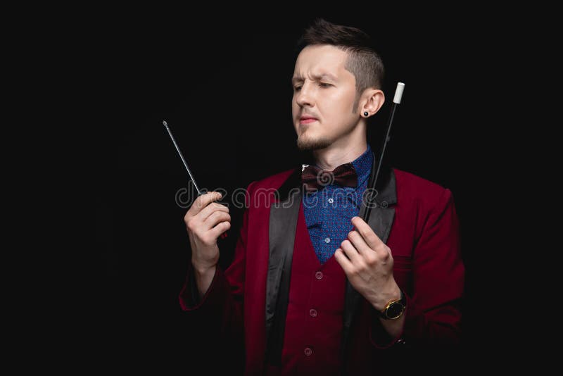 Male Magician is Experimenting with Magic Wands Using Screwdriver Tool ...